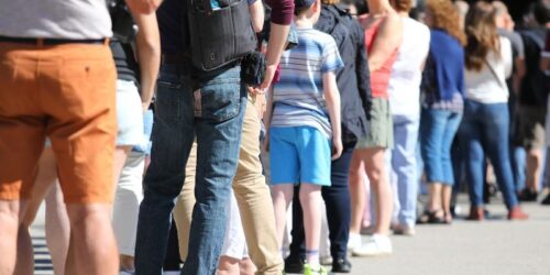 The Role of Queue Systems in Enforcing Priority Lane Rules