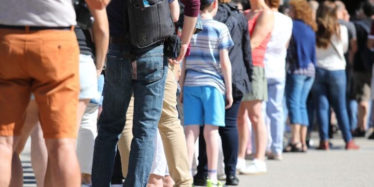 The Role of Queue Systems in Enforcing Priority Lane Rules